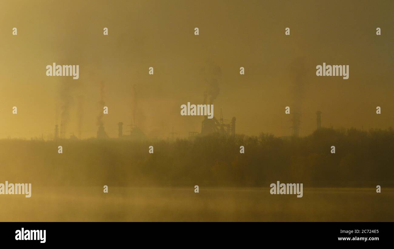 Gas, steam and smoke. Industrial chimneys time lapse. Metallurgical ...