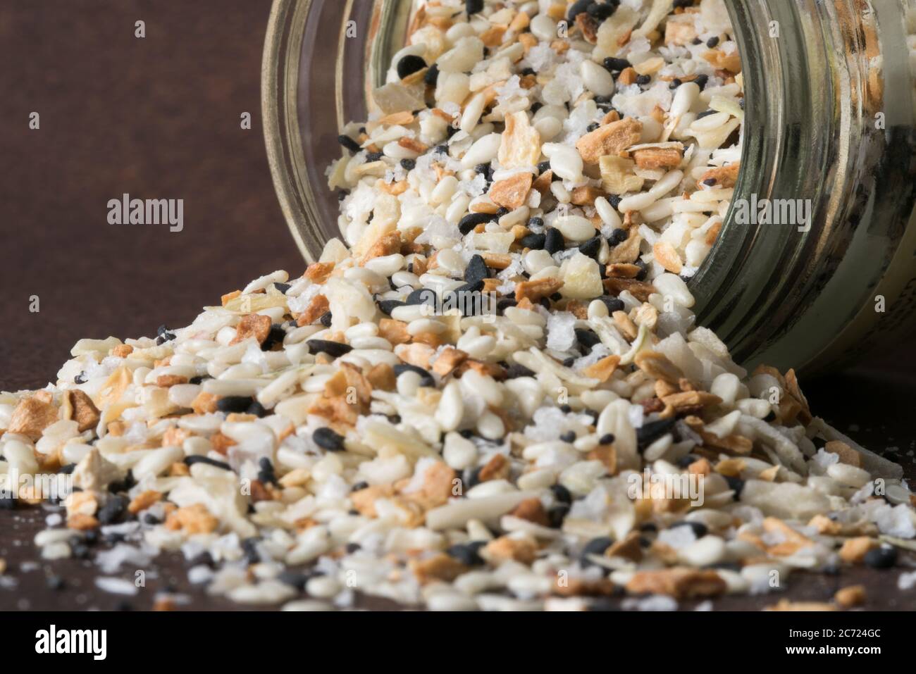 Bagel Seasoning Spilled from a Spice Jar Stock Photo - Alamy