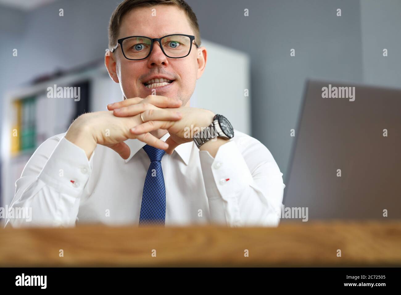 Man at workplace Stock Photo - Alamy