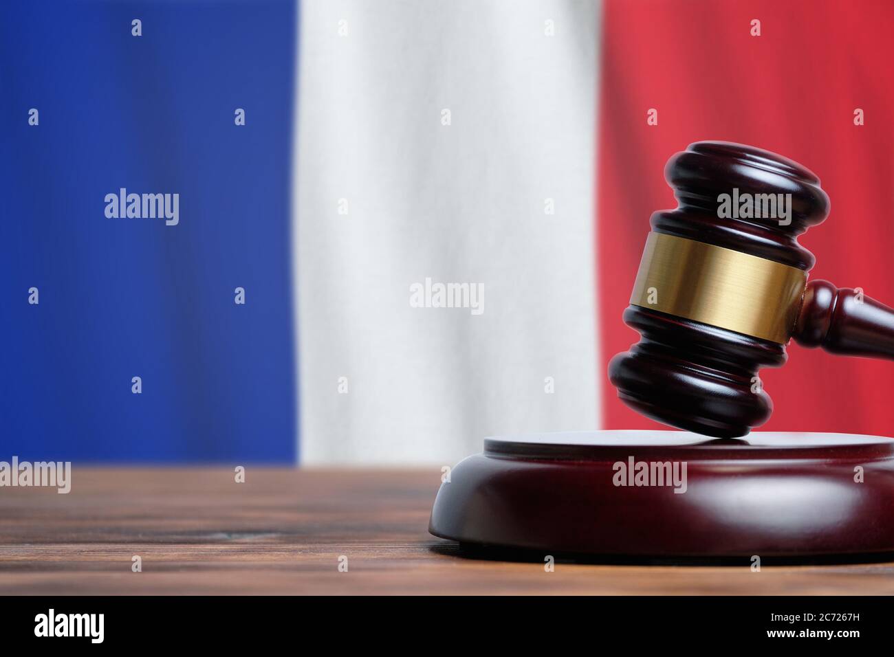 Justice and court concept in French Republic France. Judge hammer on a ...