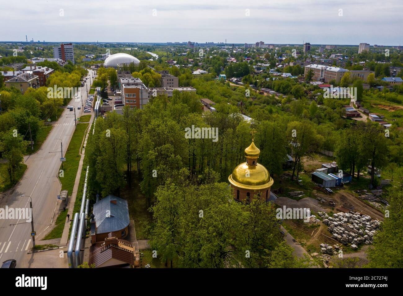 The golden dome of the chapel in the park of the Assumption Cathedral ...