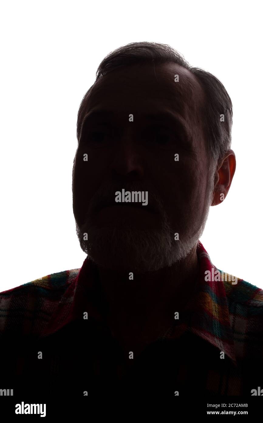 Portrait of a old man, unshaven, with beard, front view - dark isolated ...