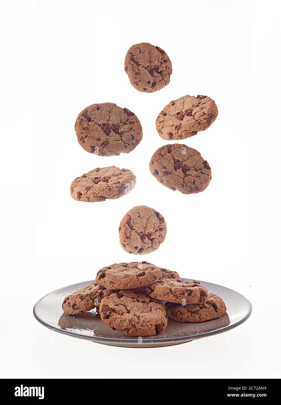 flying cookies isolated on white background Stock Photo - Alamy