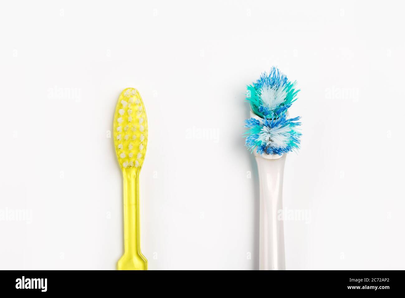 The old toothbrush and new toothbrush on a white background Stock Photo ...