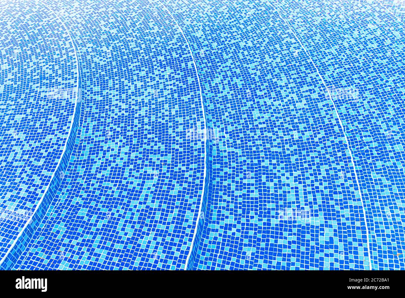 Beautiful swimming pool with blue tiles closeup Stock Photo - Alamy