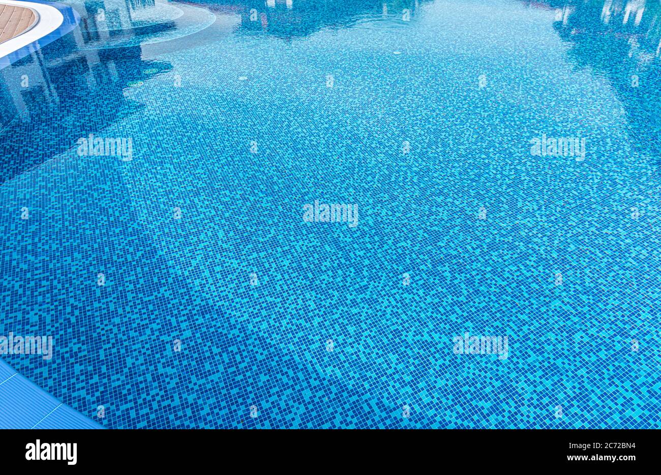 Beautiful swimming pool with blue tiles closeup Stock Photo - Alamy