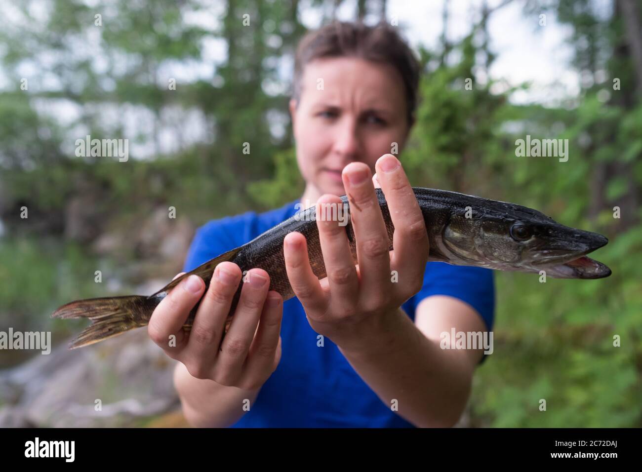 Pretty girl fishing hi-res stock photography and images - Alamy