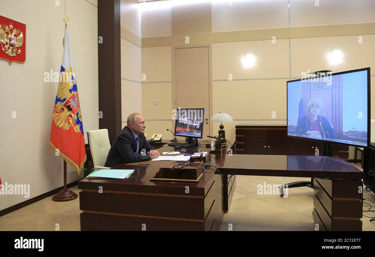 Russian President Vladimir Putin, chairs a video conference meeting ...