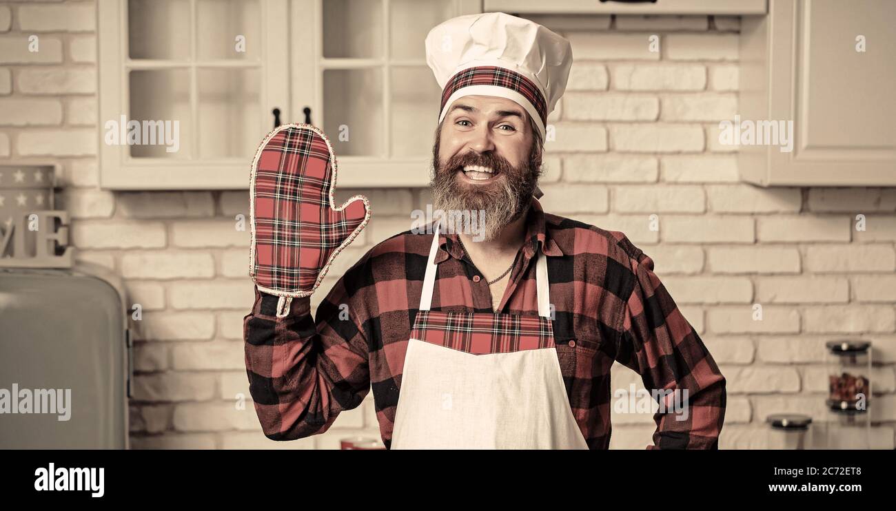 Bearded chef cooking tasty dishes on a kitchen in a restaurant Stock ...