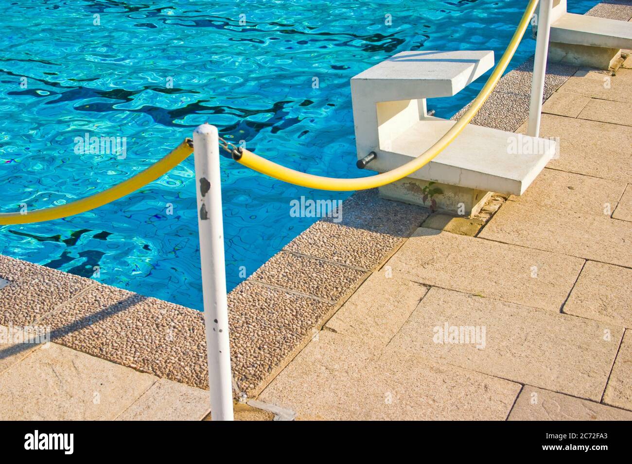 Swimming pool with starting blocks Stock Photo - Alamy