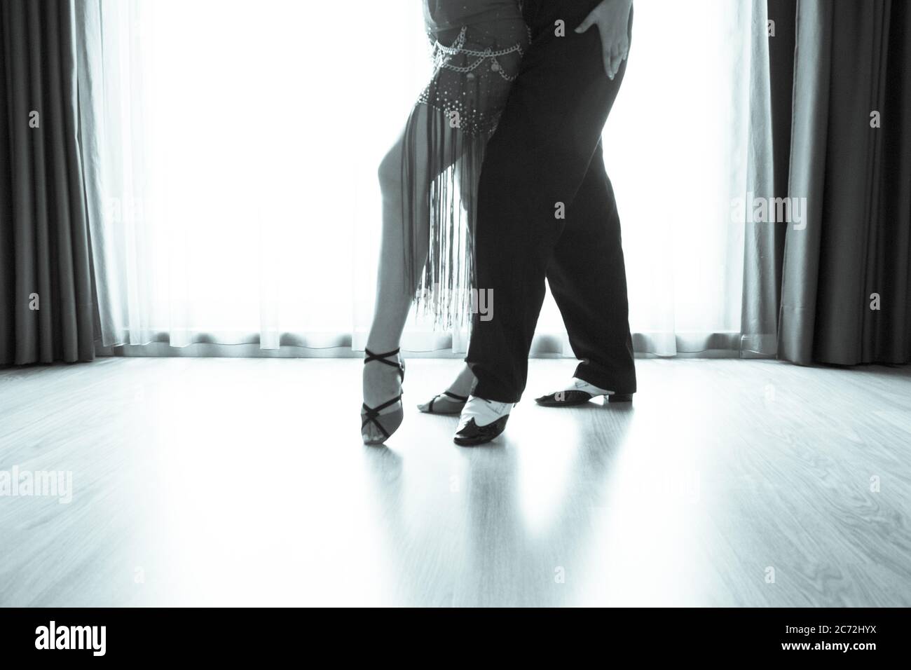 Legs of male and female latin salsa dancers. Move on Stock Photo - Alamy