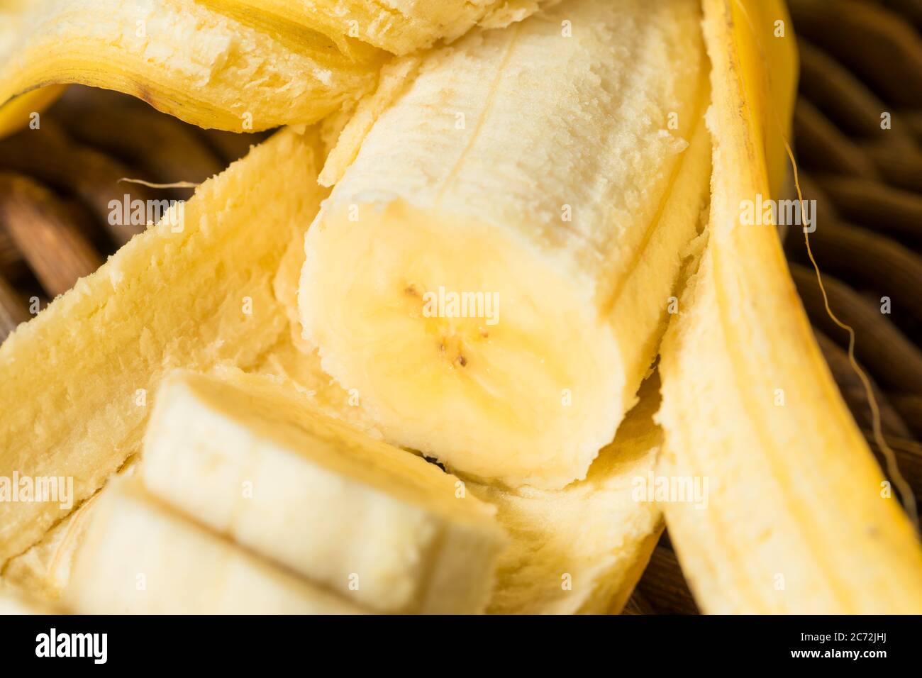 Raw Yellow Organic Bananas in a Bunch Stock Photo - Alamy