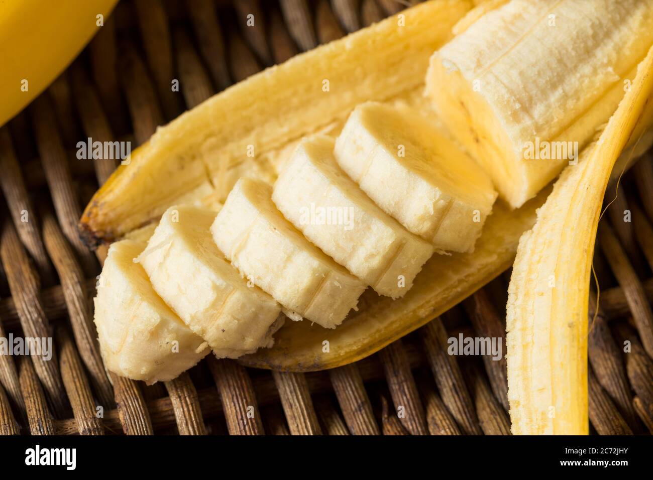 Raw Yellow Organic Bananas in a Bunch Stock Photo - Alamy