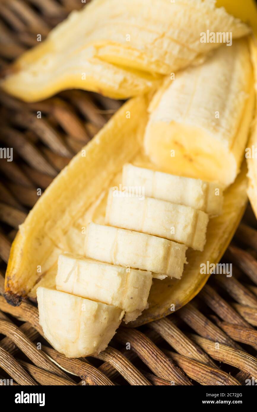 Raw Yellow Organic Bananas in a Bunch Stock Photo - Alamy
