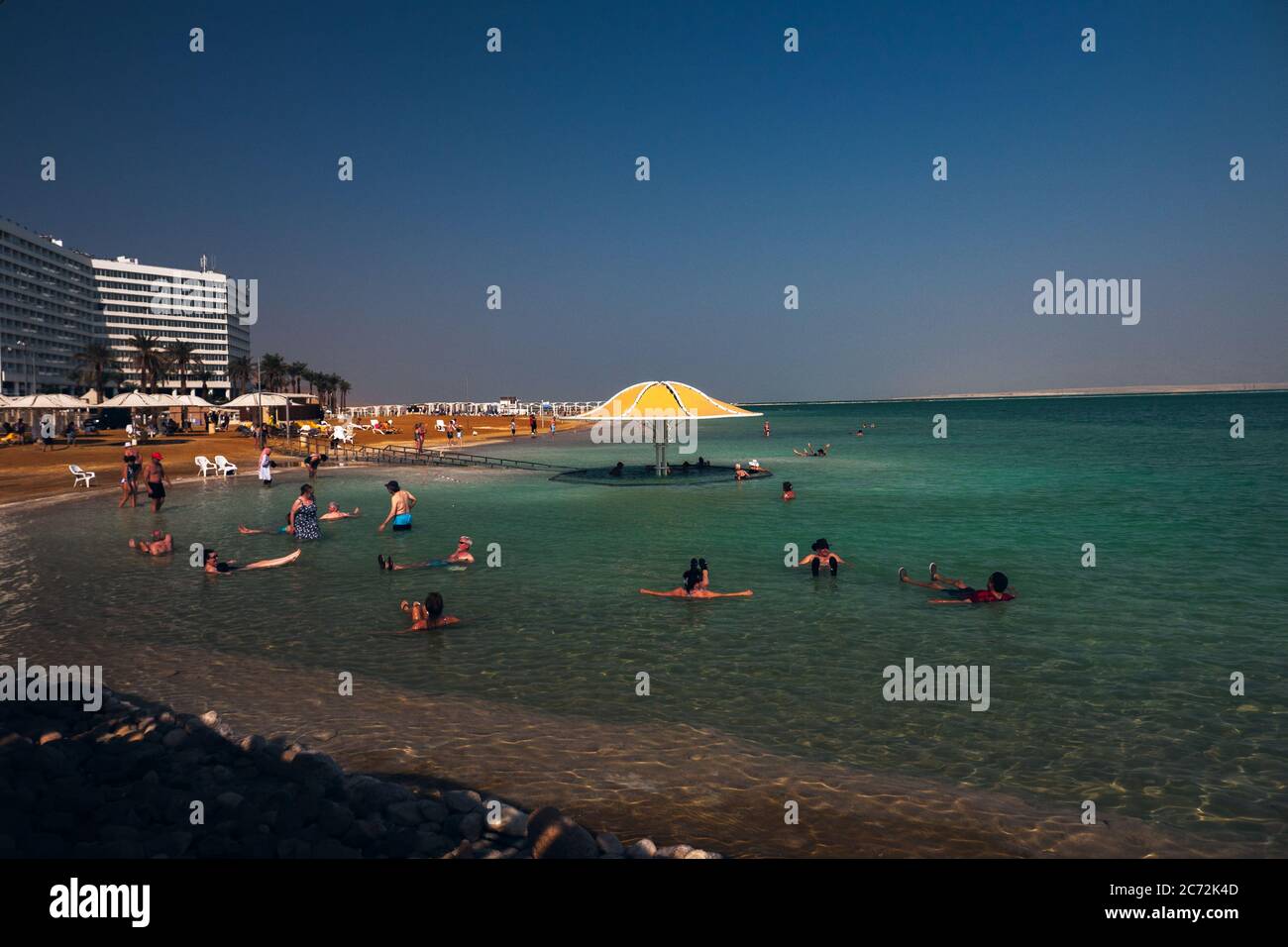 People floating in the dead sea, dead sea Israel Stock Photo - Alamy