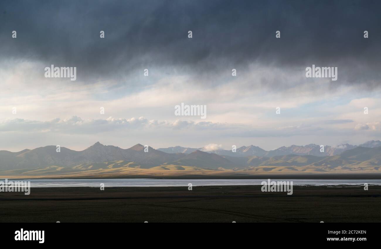 Impending storm clouds above Son Kol lake, Kyrgyzstan Stock Photo - Alamy