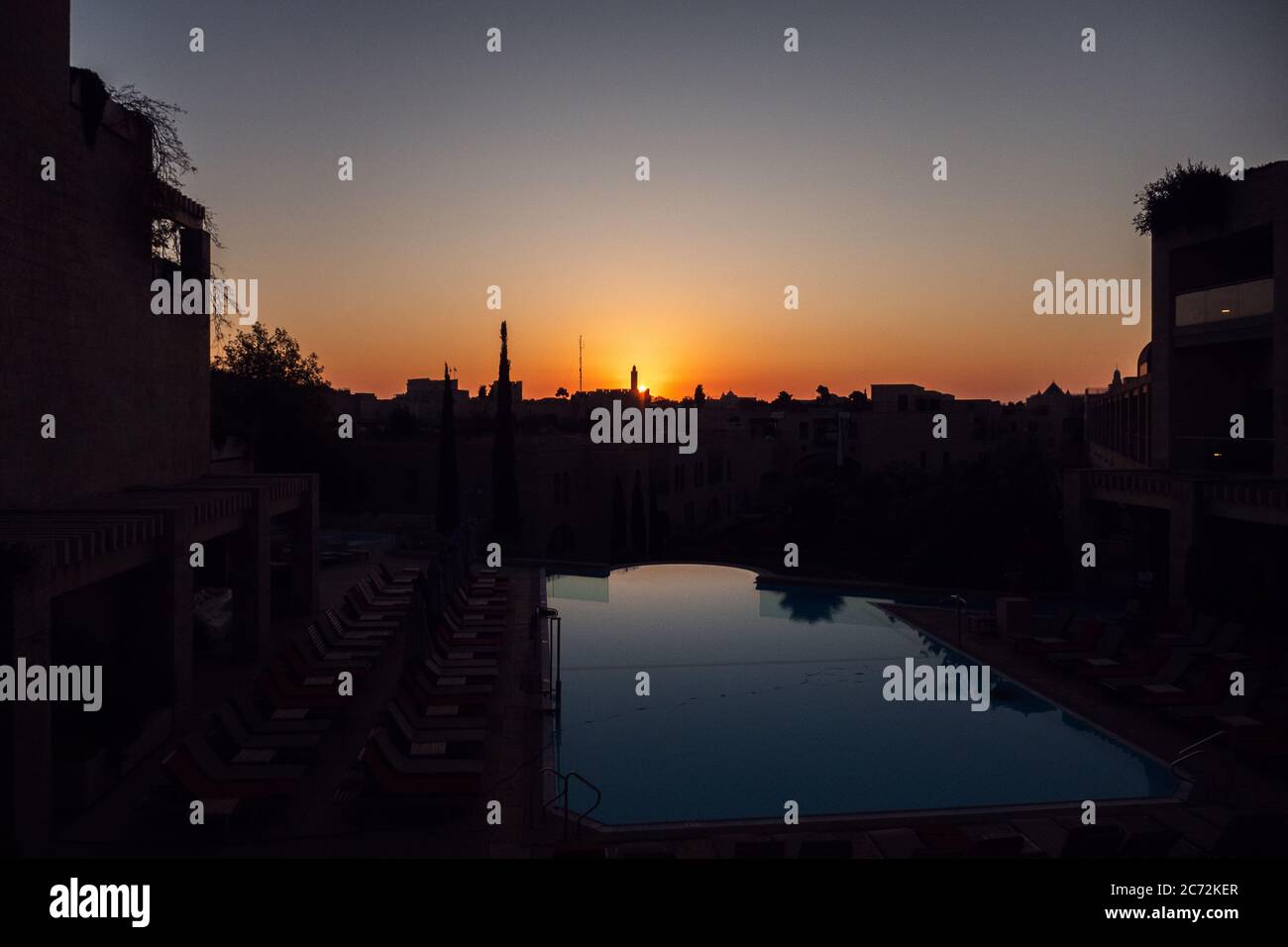 Sunset on the swimming pool, city of Jerusalem Israel Stock Photo - Alamy