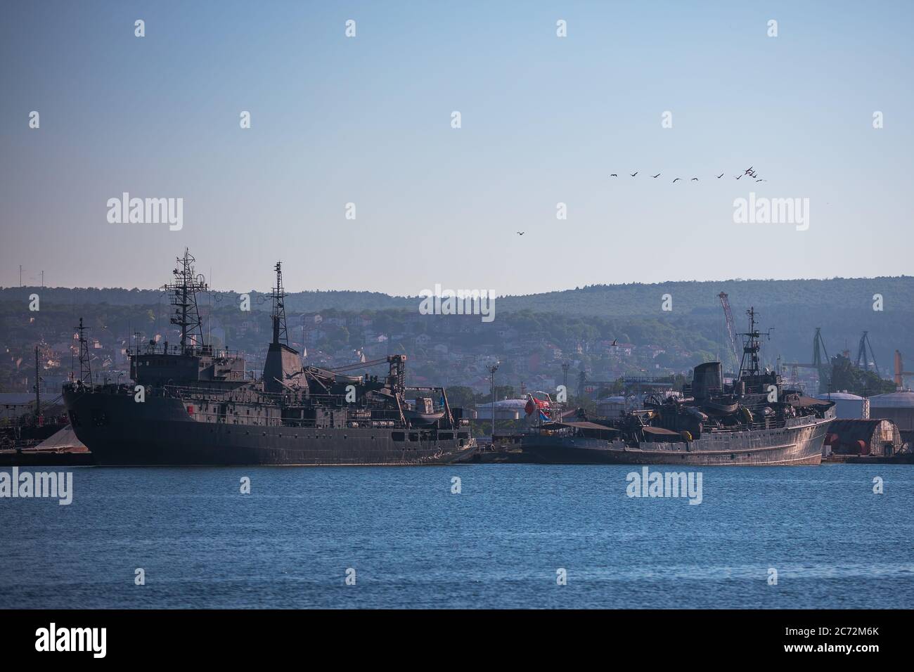 Military ships moor in sea harbour Stock Photo - Alamy