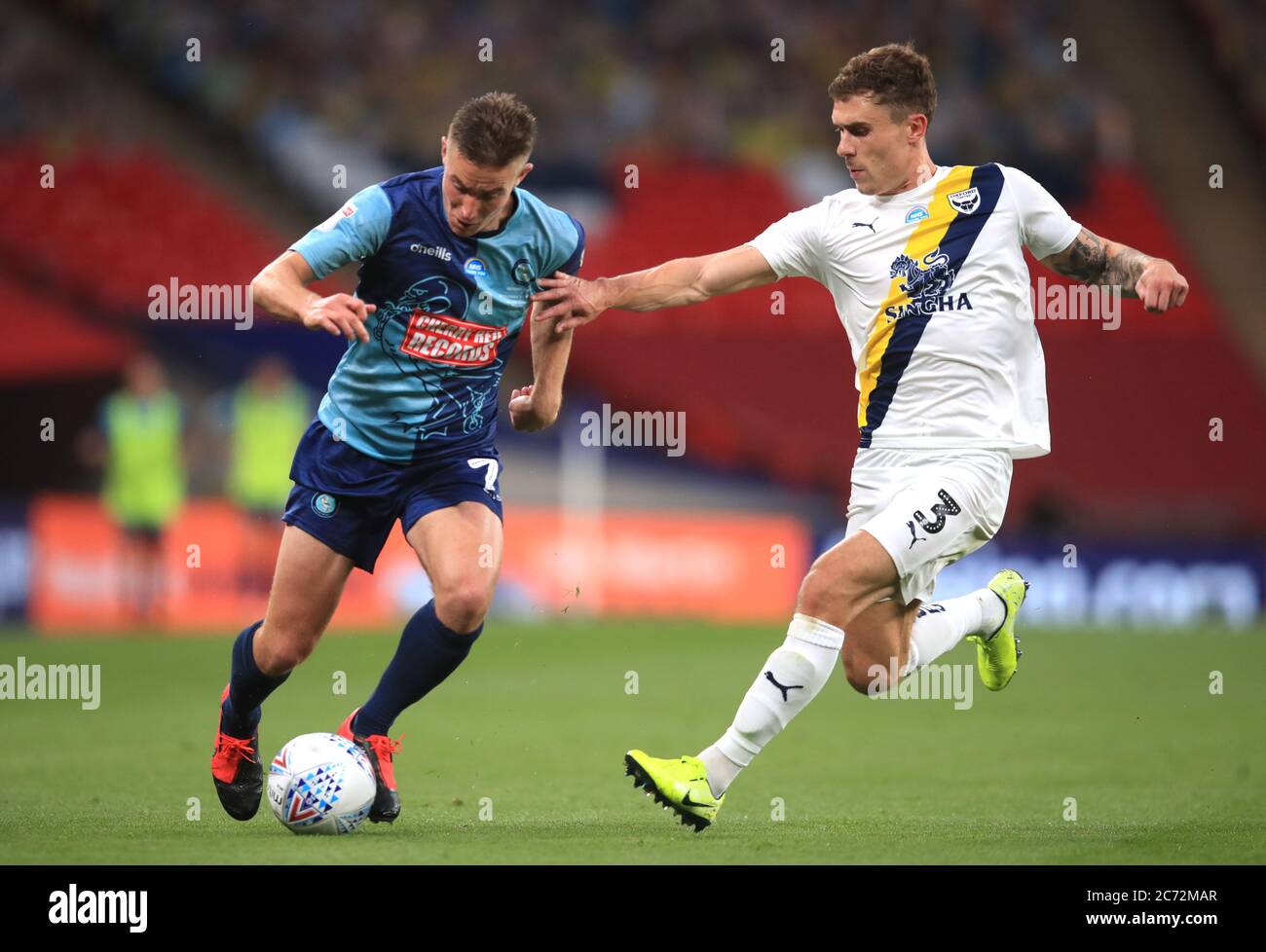 Wycombe Wanderers' David Wheeler (left) and Oxford United's Josh ...
