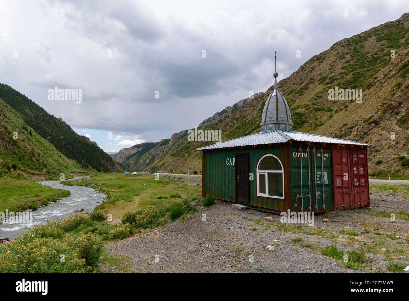 Small mosque made from two containers next to a high altitude road in ...
