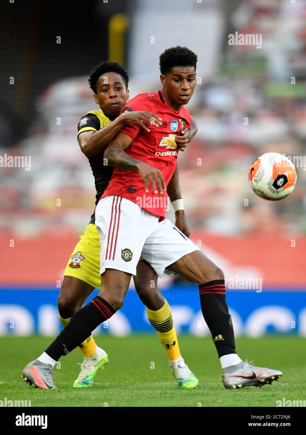 Southampton's Kyle Walker-Peters (left) and Manchester United's Marcus ...