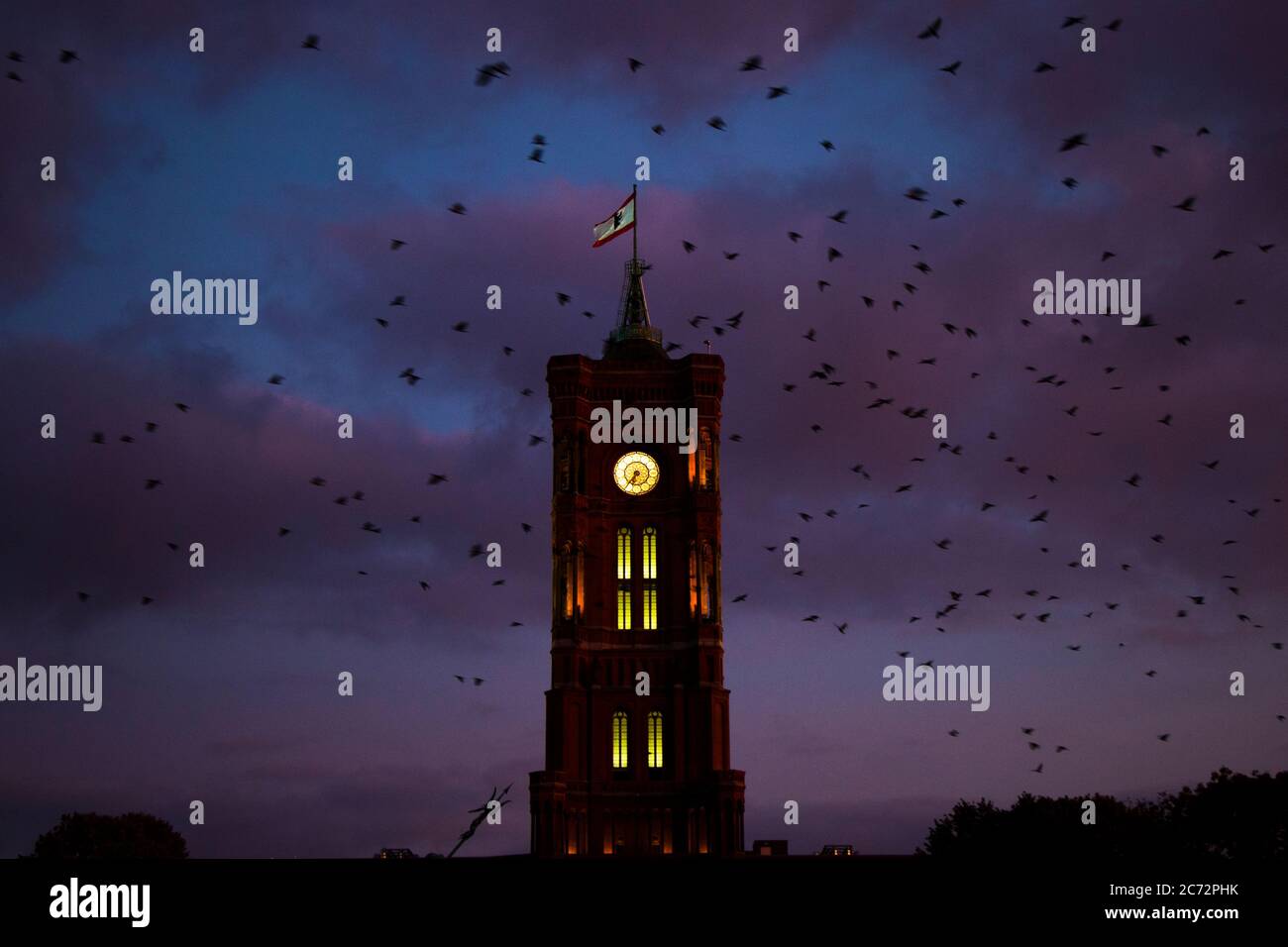Famous landmark and architecture clock tower, red tower in Berlin ...