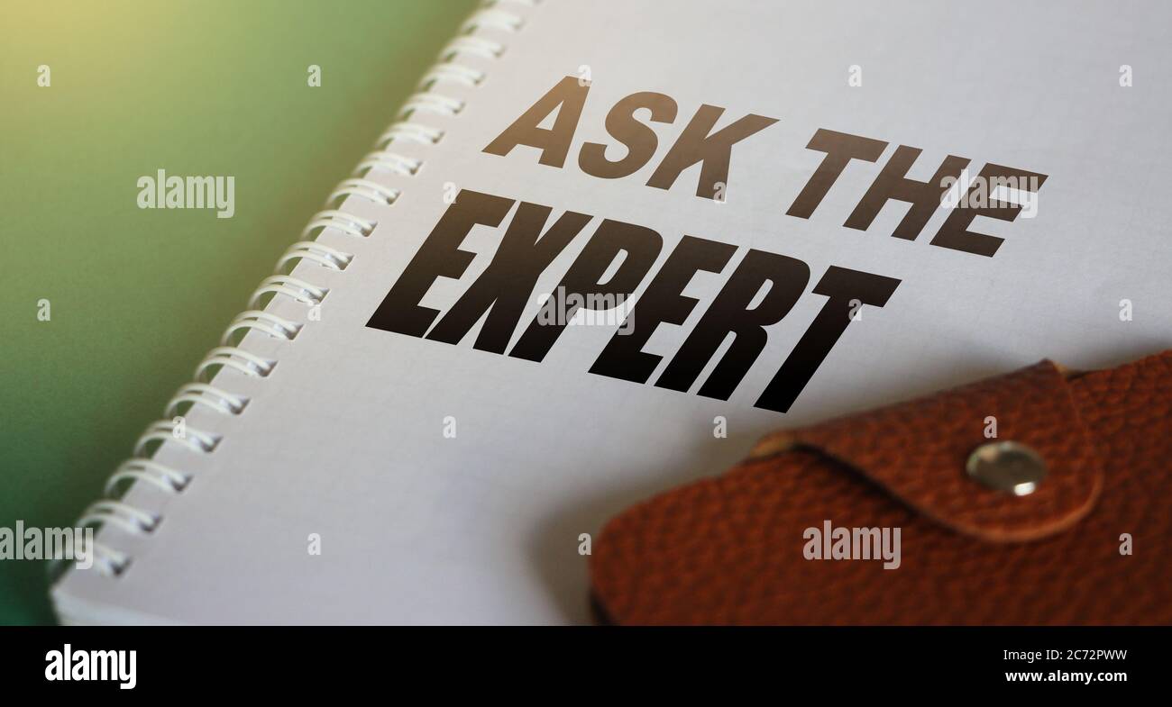 Ask the expert words in copybook and leather wallet. Consulting ...