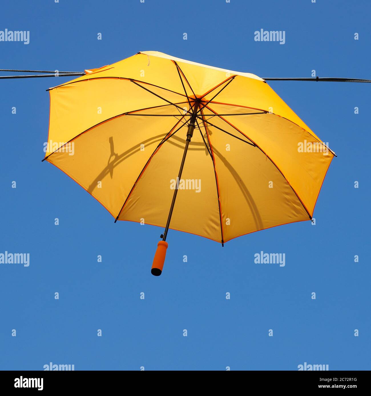 Hanging umbrella hi-res stock photography and images - Alamy