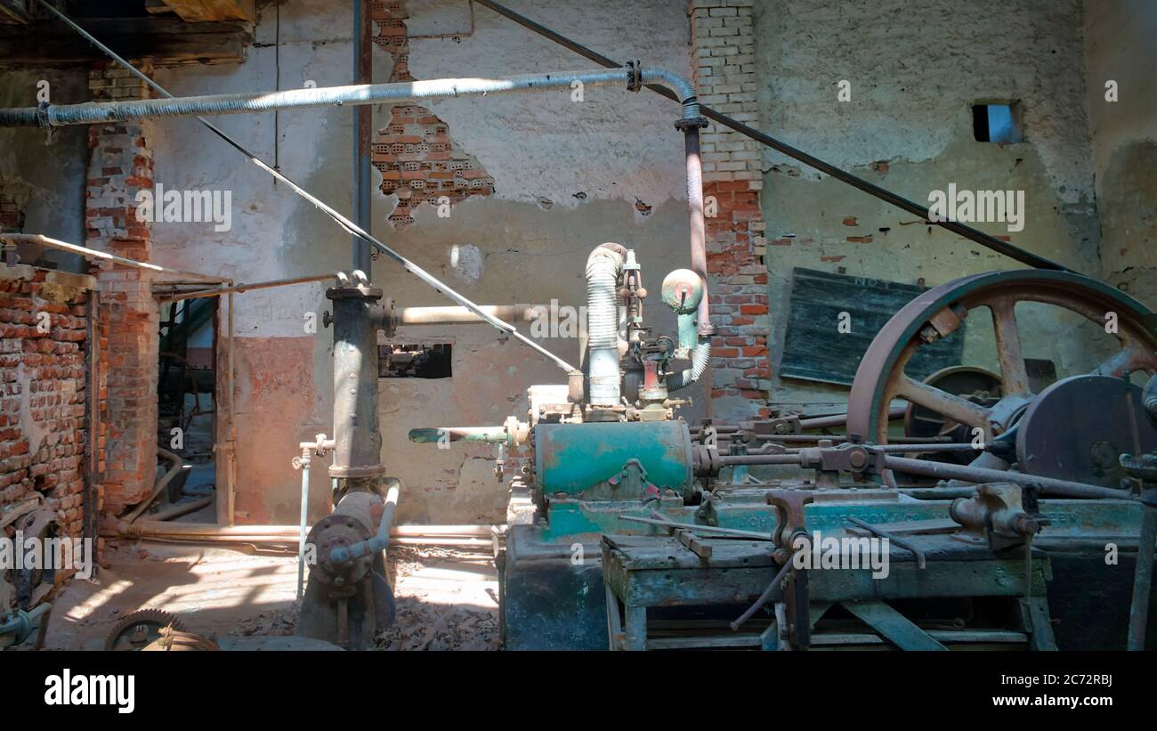 Rusty equipment in an abandoned old marble quarry factory in Marmara ...