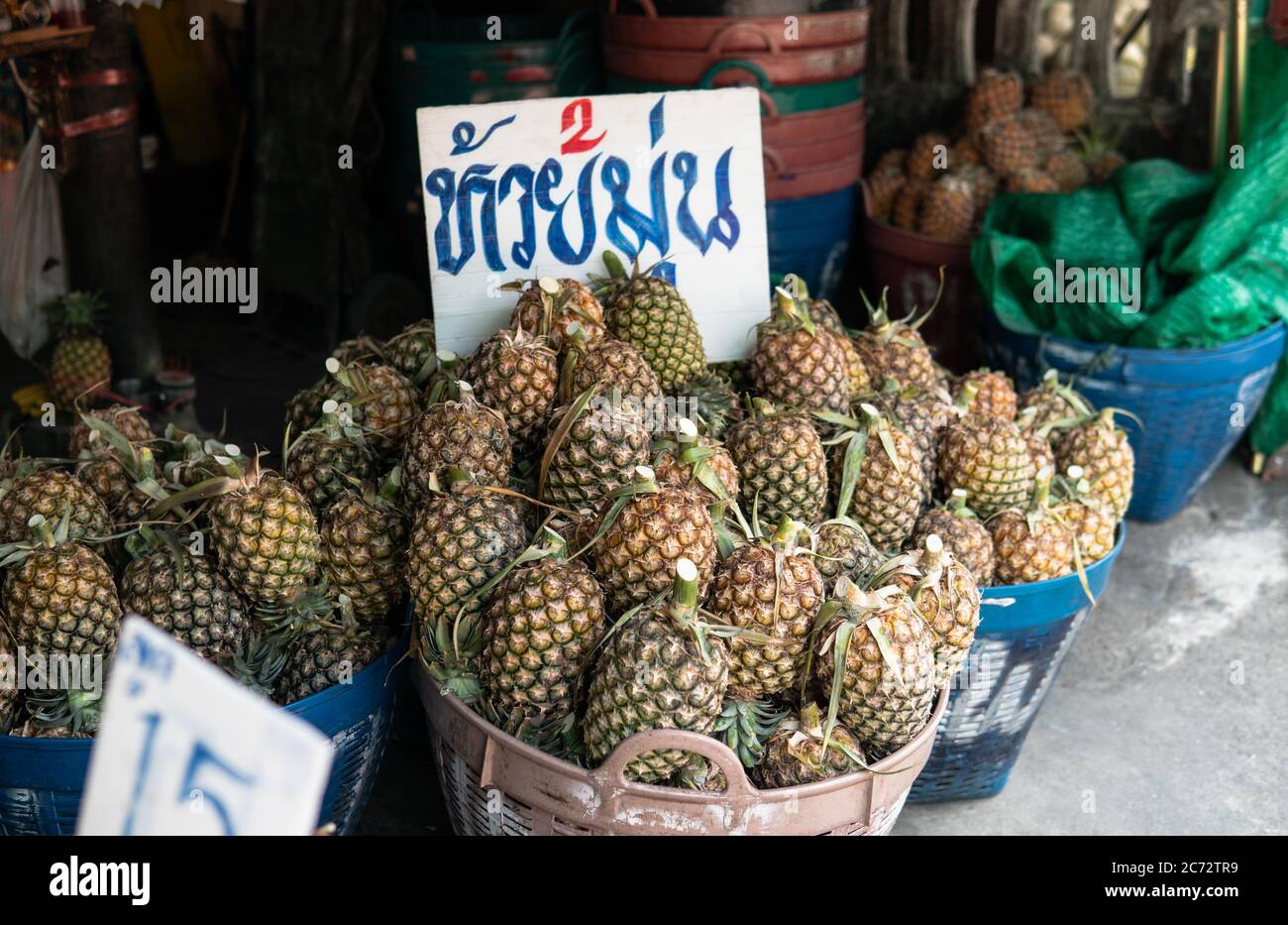 selling pineapple fruits in tropical markets in Asia. World imports of ...
