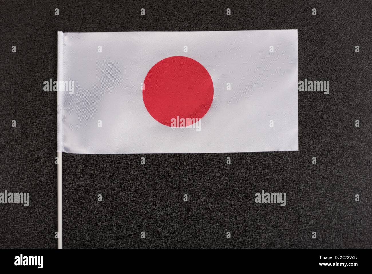 Japan flag on black background. National symbols of country of rising ...