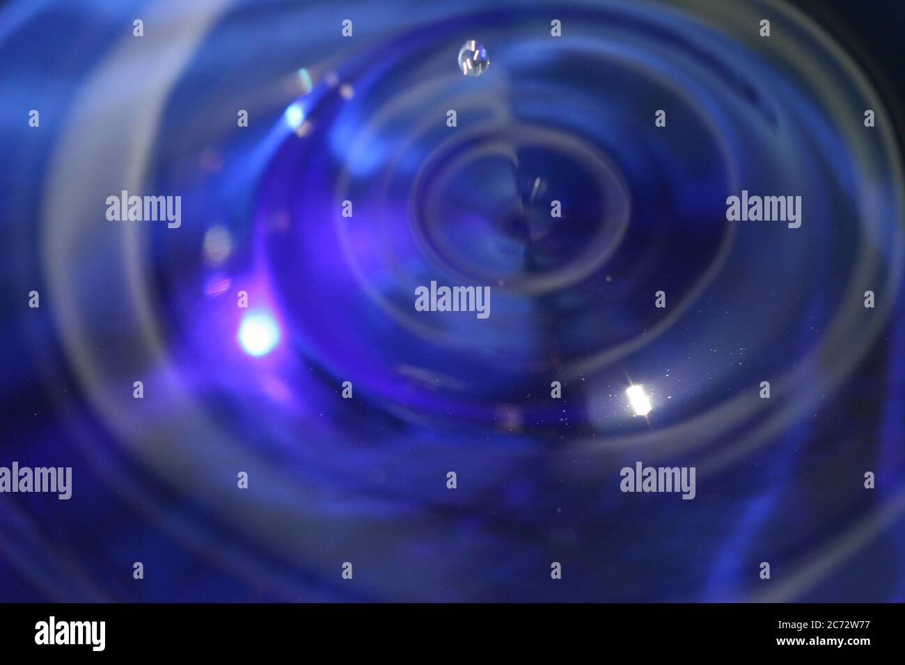 Water drops in deep blue water with ring designs and ripples Stock ...
