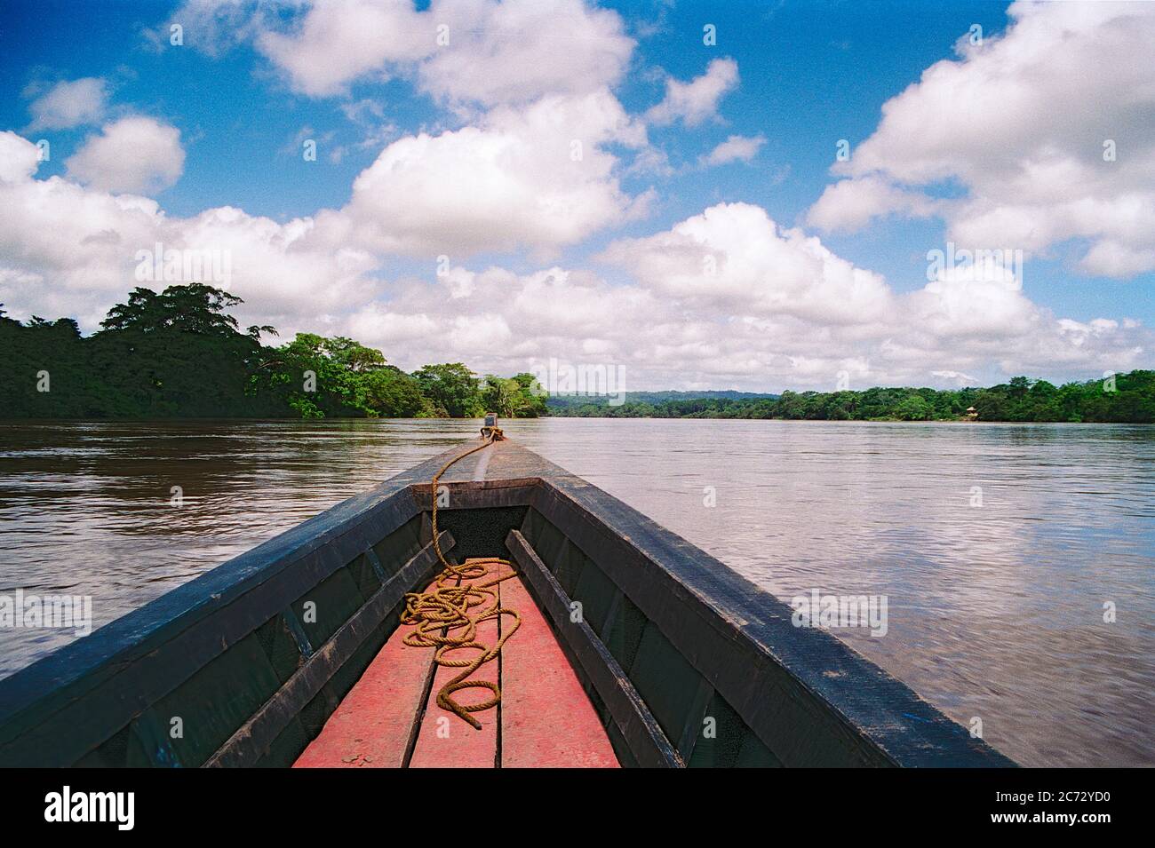 Riding in a wooden boat in the Usumacinta River ro Yaxchilan Mayan ...