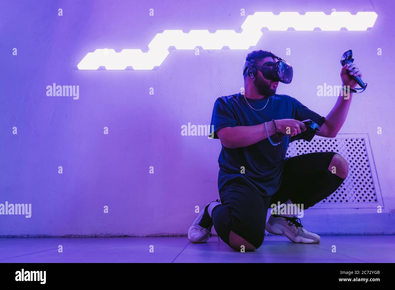 Helmet virtual man purple hi-res stock photography and images - Alamy