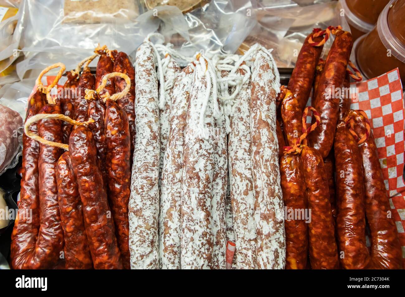 Various fresh meat products on butcher display refrigerator in bistro ...