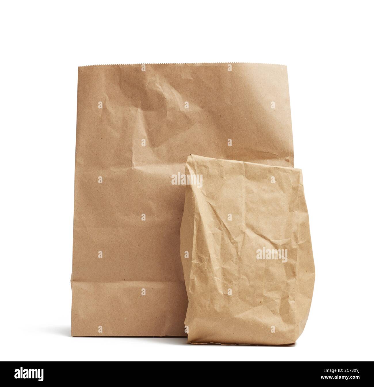 full paper disposable bag of brown kraft paper isolated on white ...