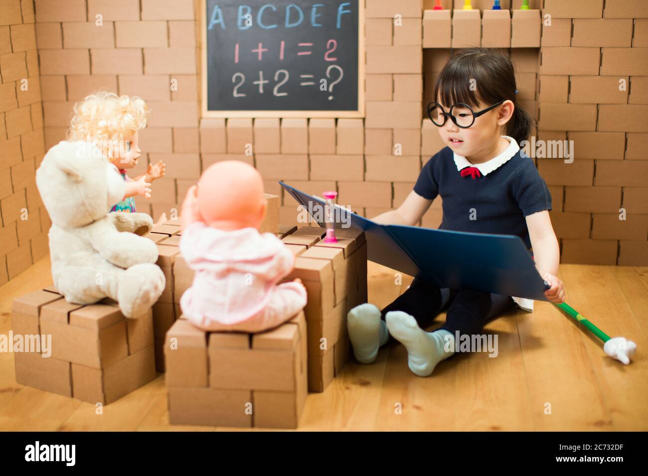 Nursery school children playing pretend hi-res stock photography and ...