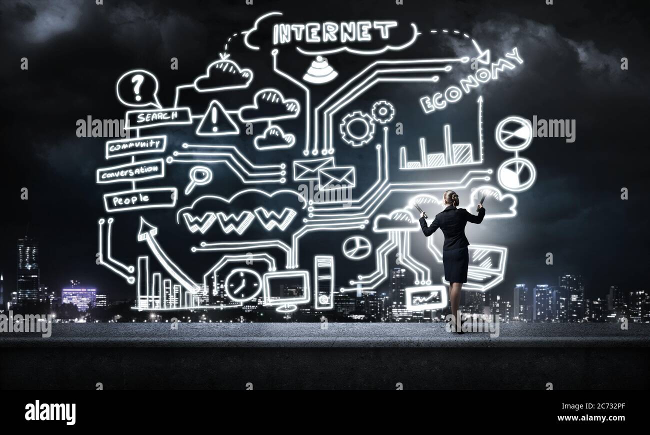 Woman throwing light on her ideas Stock Photo - Alamy