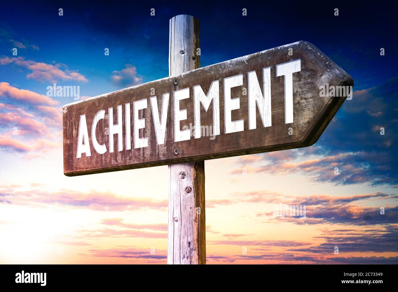 Achievement - wooden signpost, roadsign with one arrow Stock Photo - Alamy