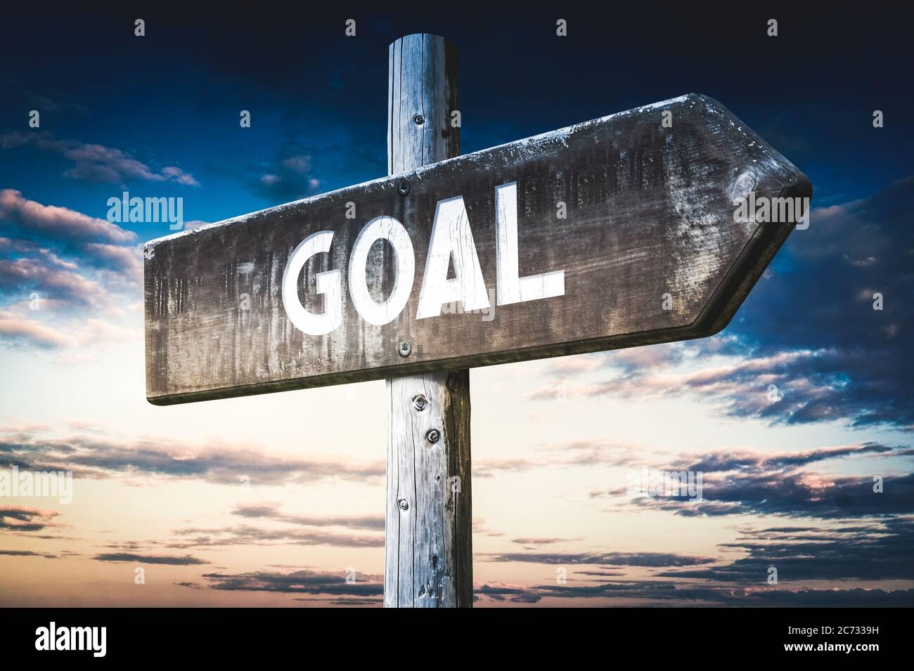 Goal - wooden signpost, roadsign with one arrow Stock Photo - Alamy