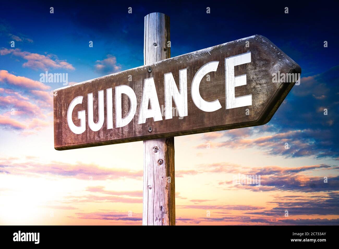 Guidance - wooden signpost, roadsign with one arrow Stock Photo - Alamy