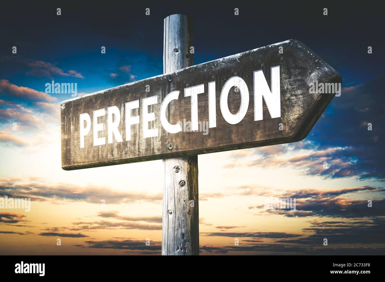 Perfection - wooden signpost, roadsign with one arrow Stock Photo - Alamy