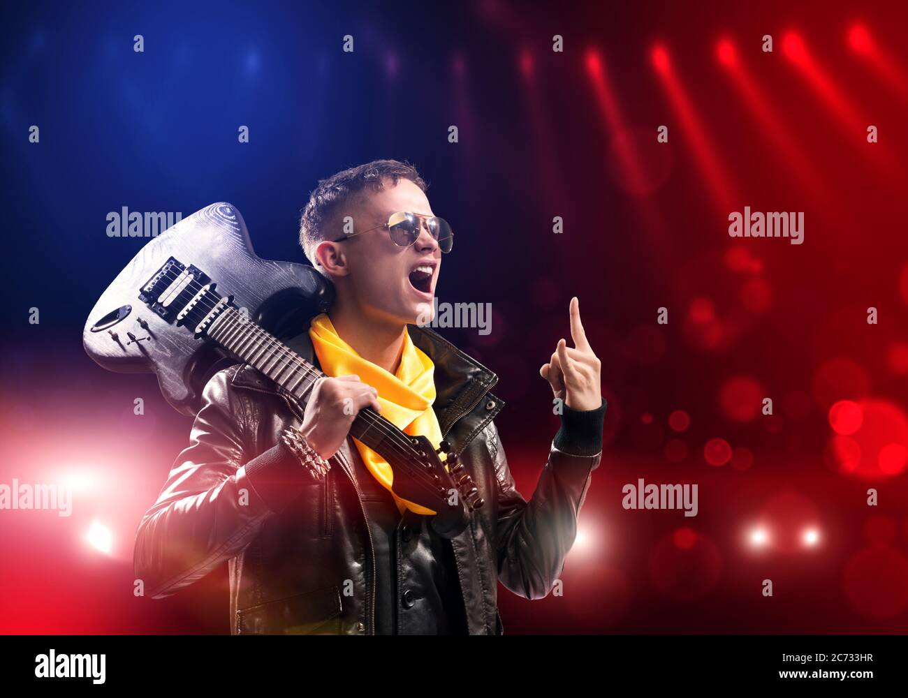 Rock star on stage Stock Photo - Alamy