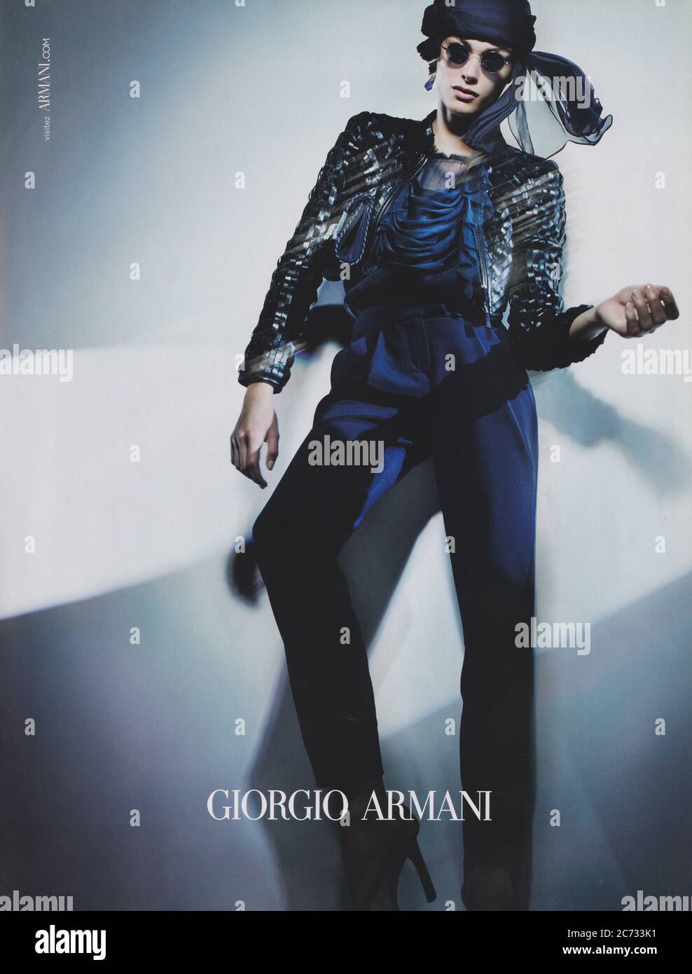 poster advertising Giorgio Armani with Elisa Sednaoui in paper magazine ...