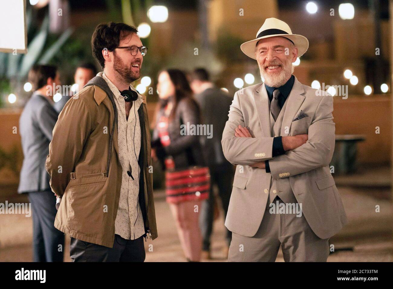 PALM SPRINGS, from left: director Max Barbakow, J.K. Simmons, on set, 2020. ph: Chris Willard ...
