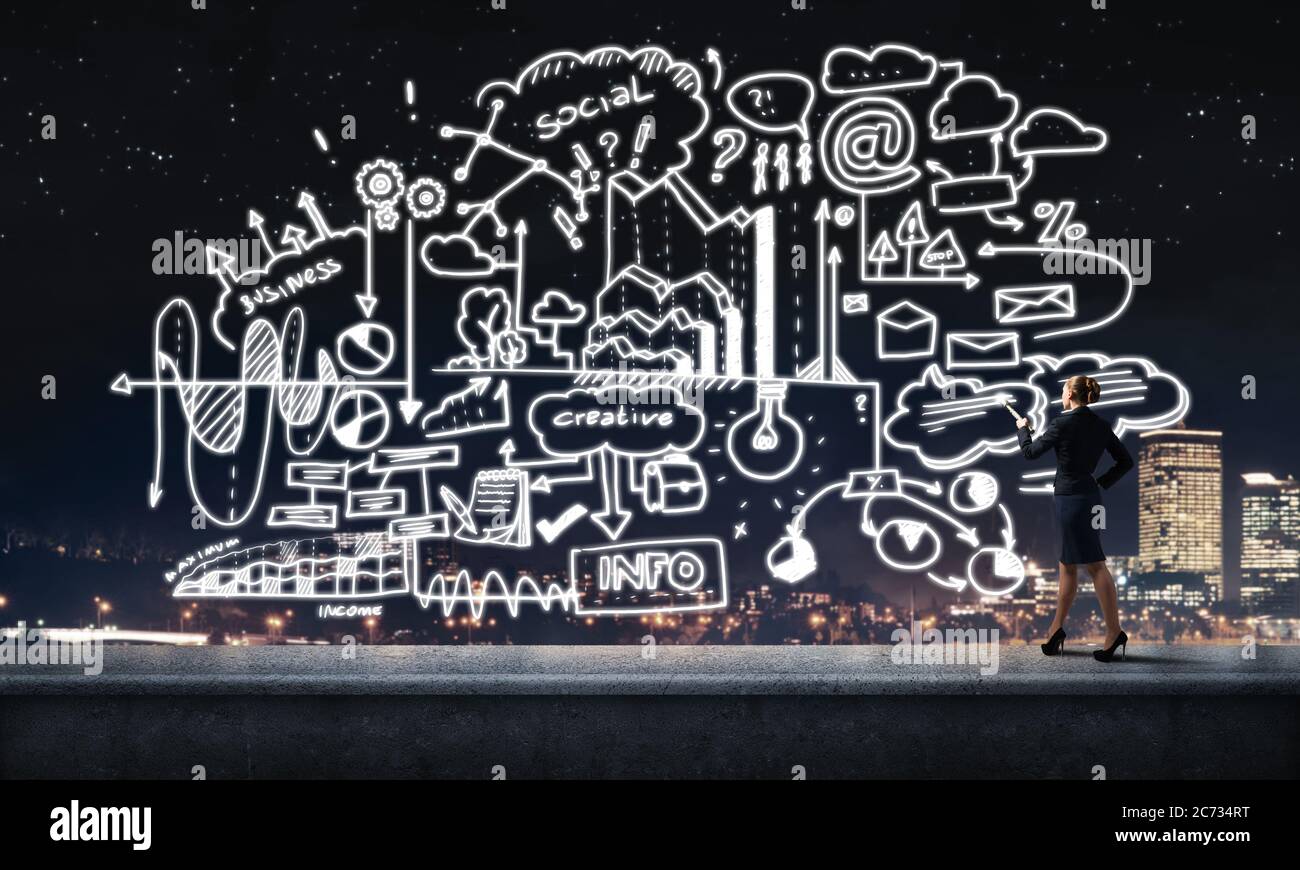 Woman throwing light on her ideas Stock Photo - Alamy