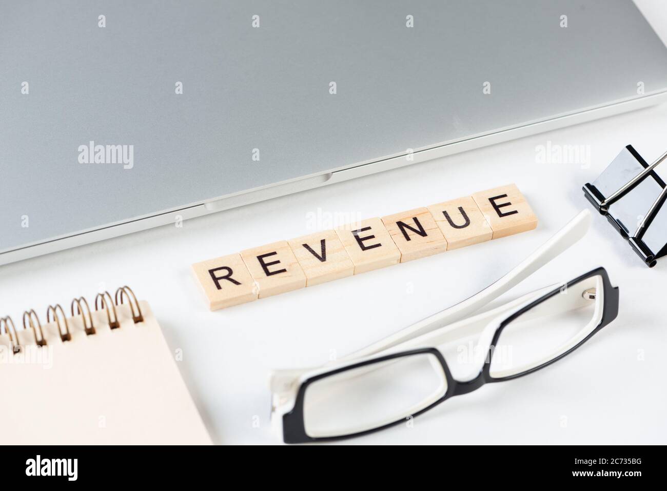 Revenue growth concept with letters Stock Photo - Alamy