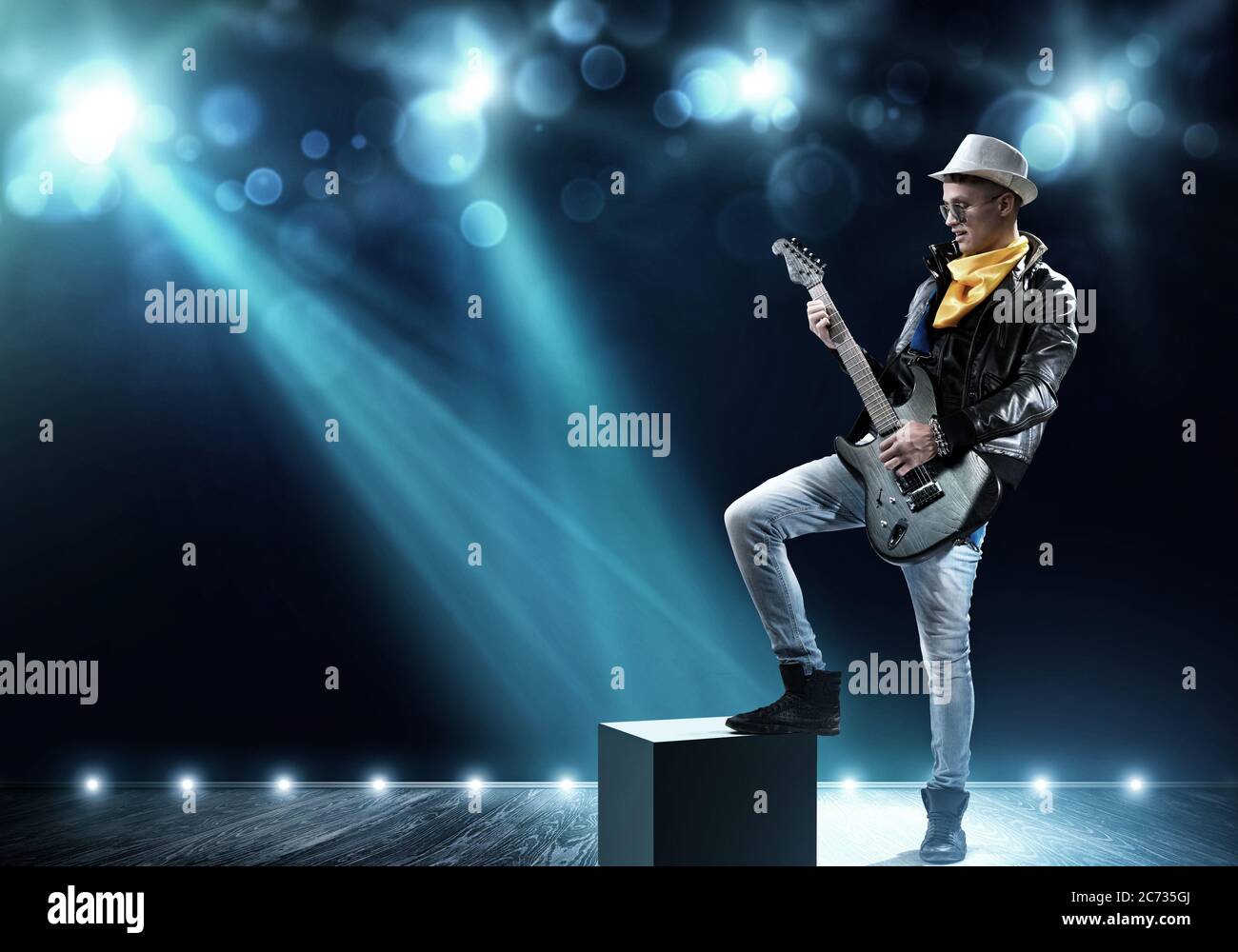 Rock star on stage Stock Photo - Alamy