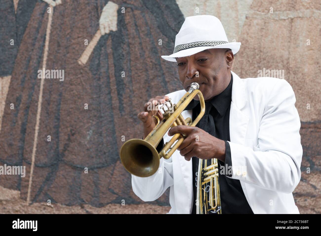 Black cuban musician playing the trumpet in Havana Stock Photo - Alamy