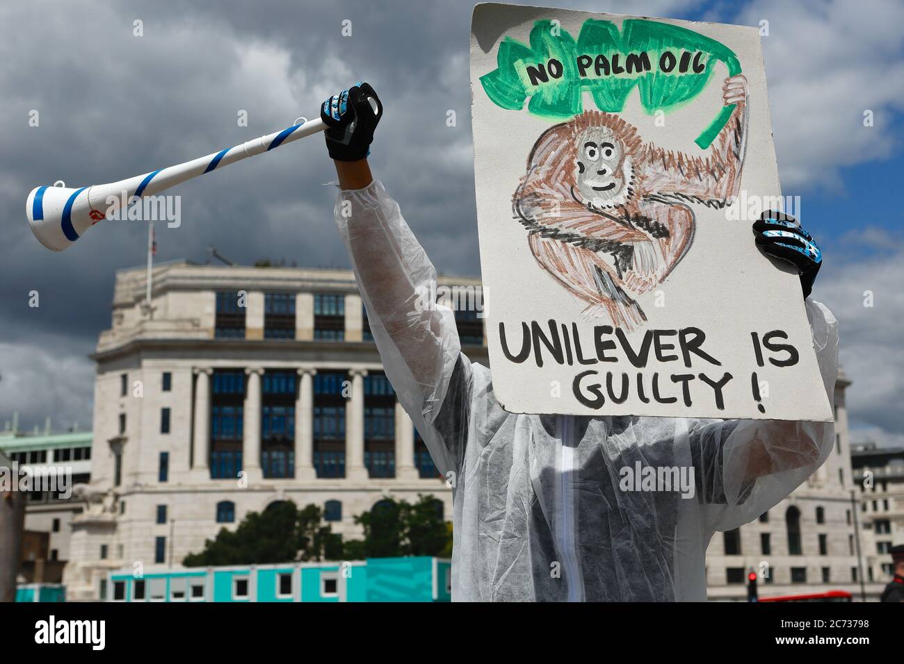 Unilever HQ - London (UK), July 11 2020: A man holding a placard ...